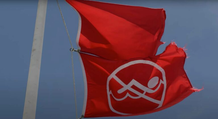 The Meaning of Beach Flags - What Different Flag Colors Mean?